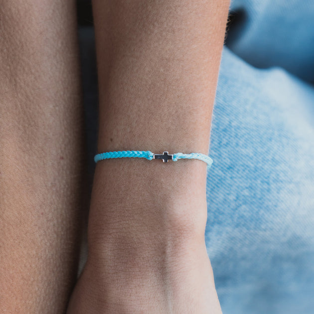 Wear Felicity's Simple Cross Cord Bracelet - Elegant Faith Expression